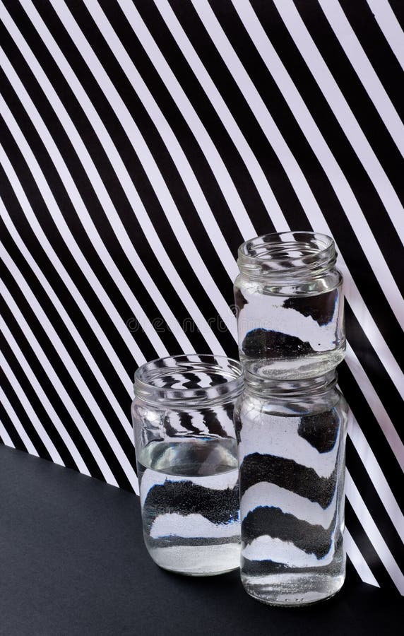 Three Glass Jars Placed Together of Heterogeneous Sizes with Water ...