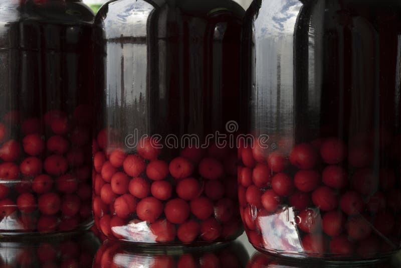 Three Glass Jars with Home-preserved Red Cherries Stock Photo - Image ...