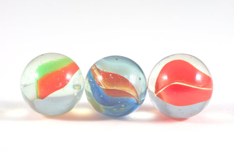 Three marbles stock image. Image of planet, marbles, yellow - 14640129