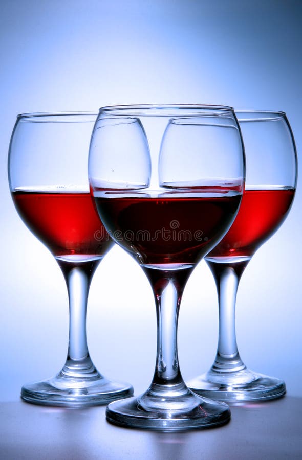3+ Dark blue bottle three wine glasses Free Stock Photos - StockFreeImages