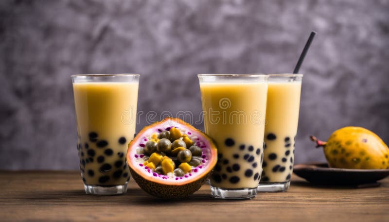 Three Glasses of Bubble Tea with a Fruit on the Table Stock ...