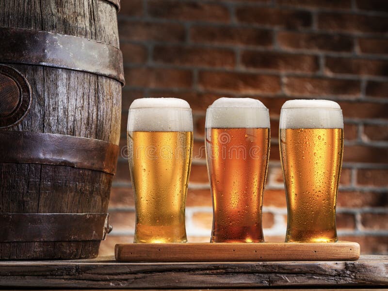 Three Glasses Chilled Beer Old Wooden Table Brick Wall Background Stock ...