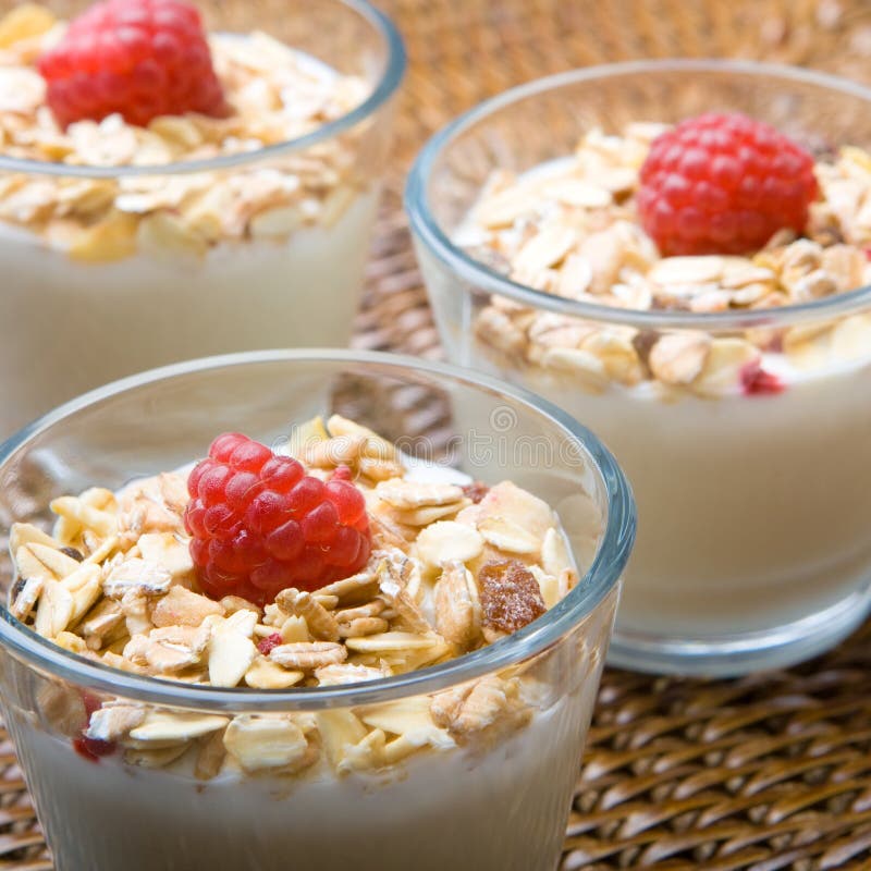 Three Glasses of Fresh Yogurt and Muesli Stock Photo - Image of ...