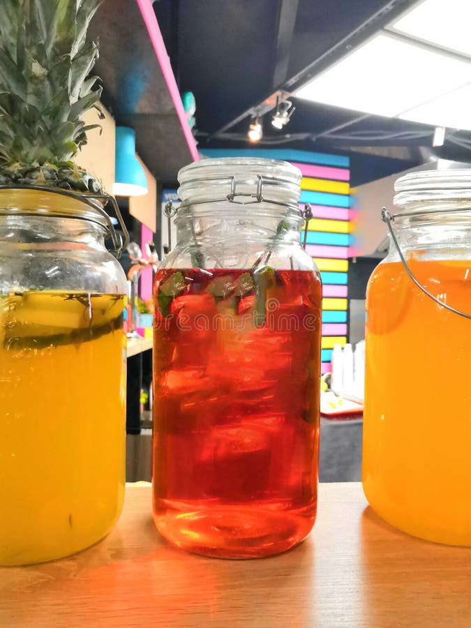 Three Glasses of Soft Drink, Yellow, Red and White with Straws Stock ...