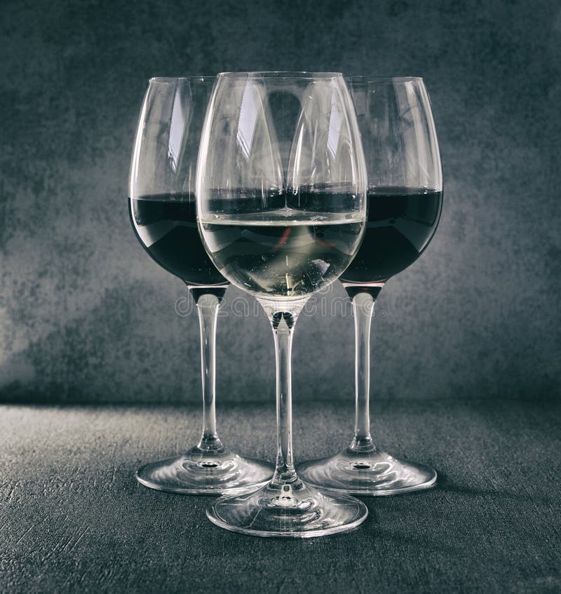 Three glasses of wine stock photo. Image of alcohol - 140999282