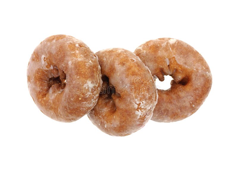 Three Glazed Donuts stock photo. Image of tasty, stacked - 23654564