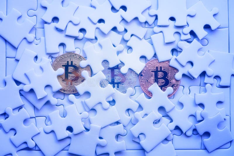 Three Gold Bitcoin on White Jigsaw or Puzzle, Cryptocurrency. Mi Stock ...