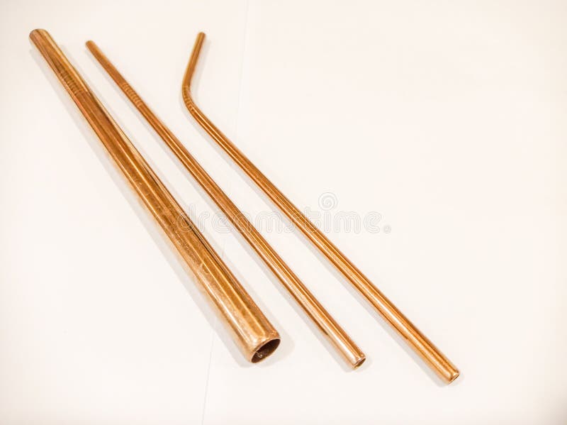 Three Golden Straws of Various Shapes and Sizes Stock Image - Image of ...