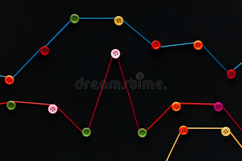 Three Graphs of Different Colors on a Black Background , Shot from ...