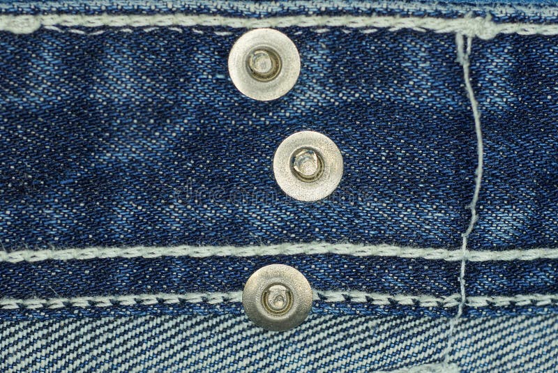 Gray Metal Rivets on Blue Cotton Fabric Stock Photo - Image of blue ...