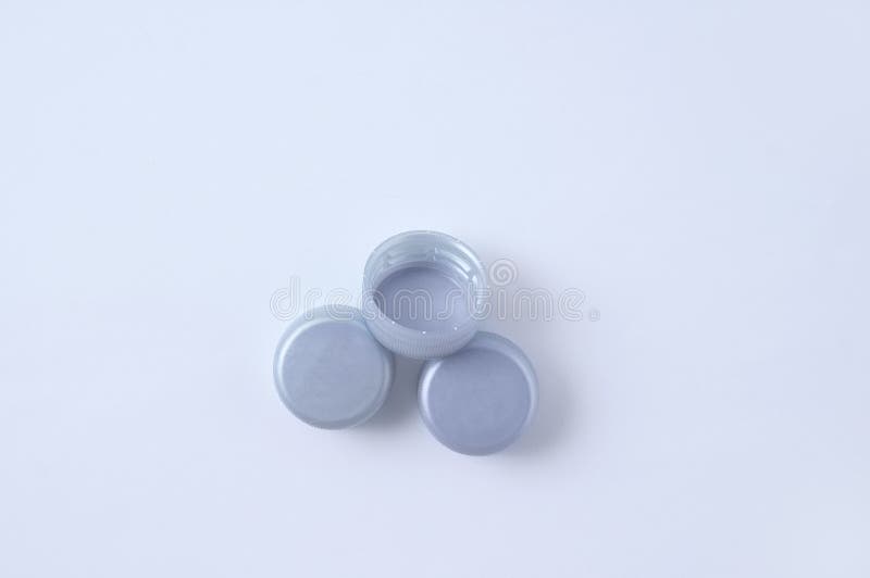 Three Gray Plastic Bottle Caps White Background Stock Photos - Free ...