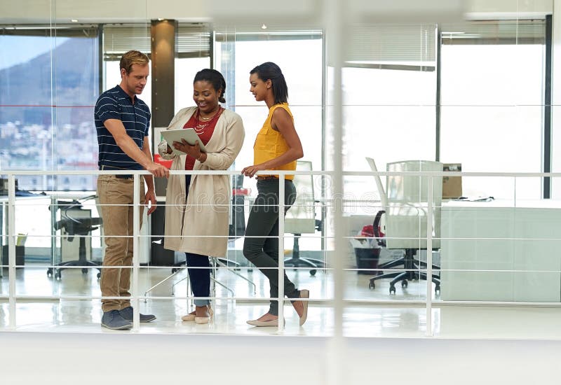 Three Great Minds Working Together. a Three Work Colleagues Talking ...