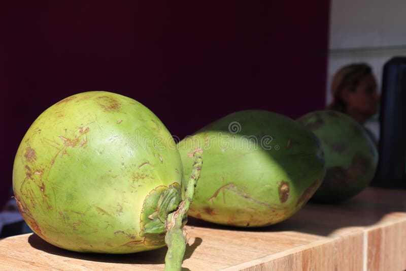 Three Green Coconuts on the Table. Stock Image - Image of fruit ...