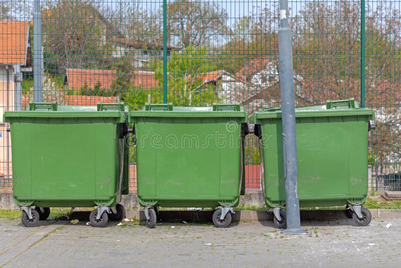 Green Dumpster Containers stock image. Image of waste - 220350817