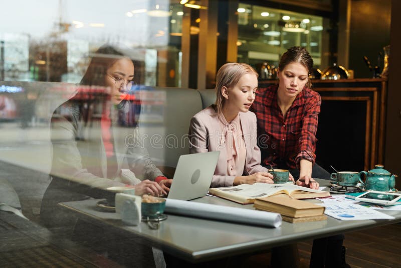 Students Doing Homework at Cafe Stock Image - Image of people, report ...