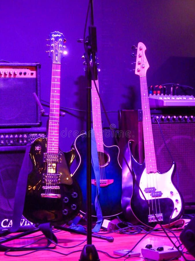Three guitars stock photo. Image of rock, drums, guitar - 355798788