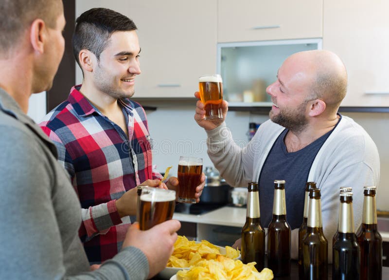 Three guys at house party stock photo. Image of caucasian - 50111240