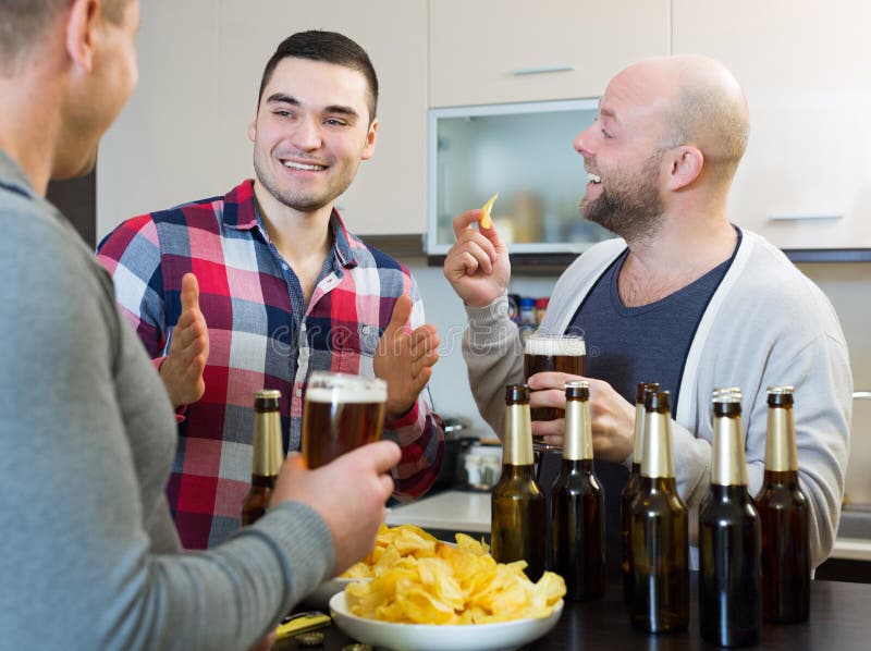 Three guys at house party stock photo. Image of caucasian - 50111240