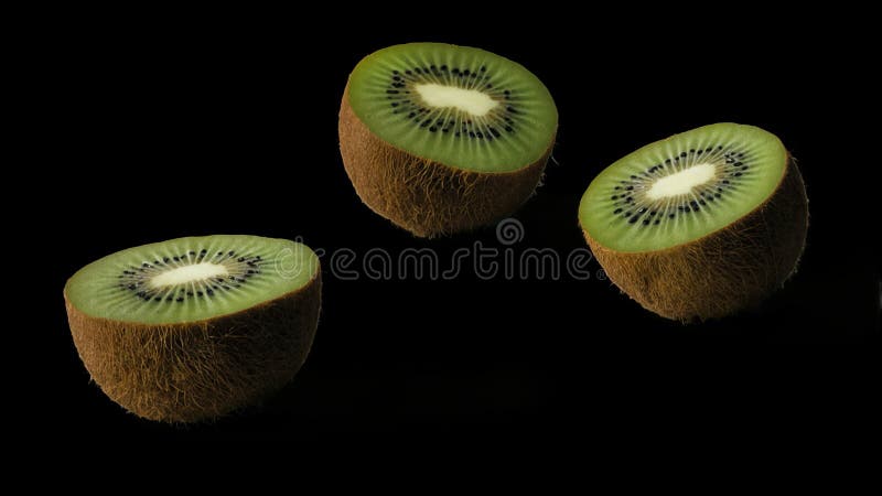 Three Halves of Kiwis Cut in Half Stock Photo - Illustration of three ...