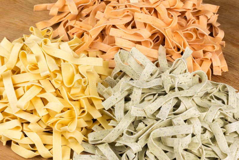 Three Handfuls of Pasta of Different Colors Stock Image - Image of ...