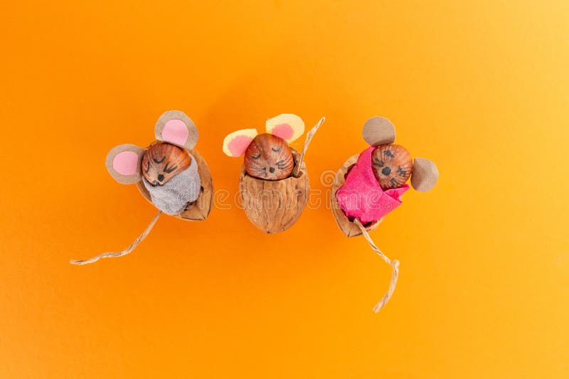 Three Handmade Mice Crafts Made from Hazelnuts and Paper, Arranged on ...