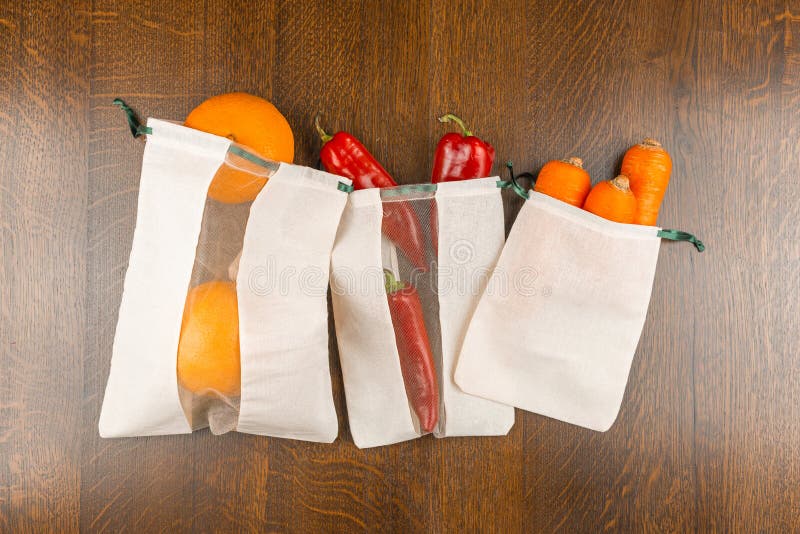 Three Handmade Reusable Sacks with Some Vegetables in Them. Stock Image ...