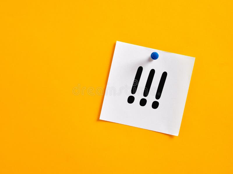 Three Handwritten Exclamation Marks on a Note Paper Pinned on a Yellow ...