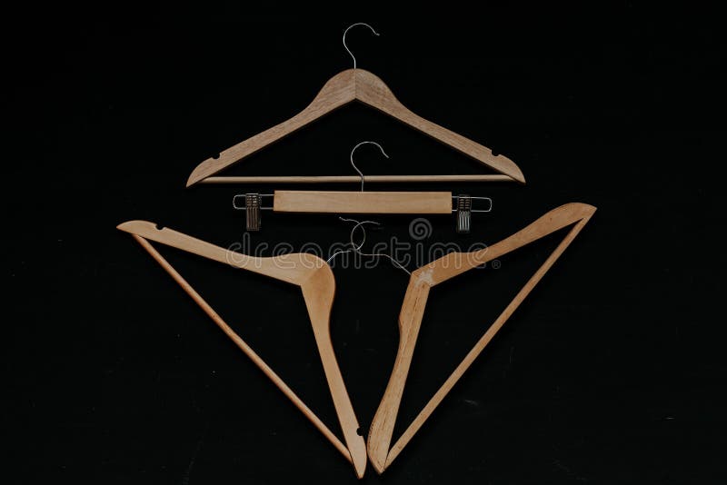 Three Hangers for Clothes on Black Vintage Stock Image - Image of ...