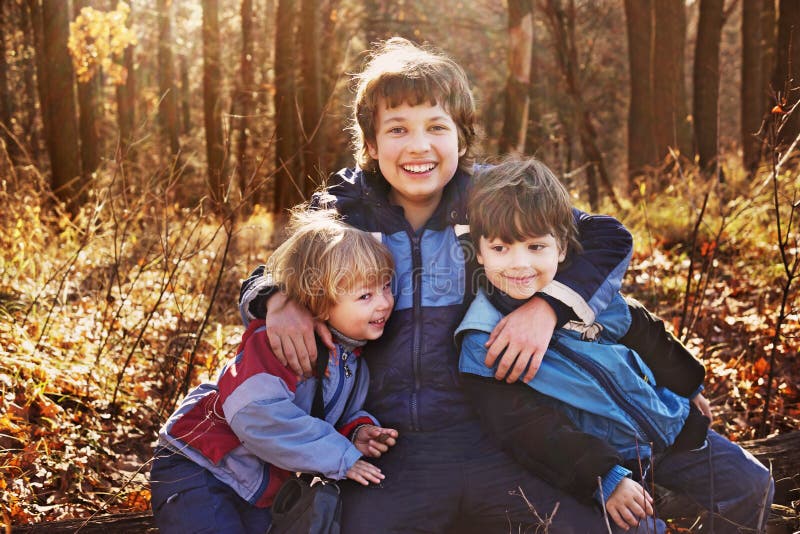 Three happy boys stock photo. Image of girls, happiness - 42498094