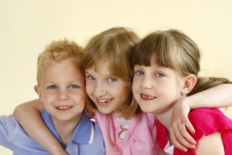 Three happy children stock photo. Image of children, arms - 5325396