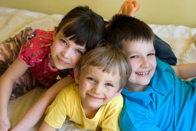 Three Happy Children Together Stock Photo - Image of bedroom ...