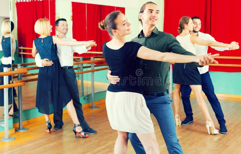 Three Happy Couples Dancing Tango Stock Photo - Image of dancer, pose ...