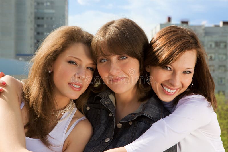 Three Happy Cute Young Girls Stock Image - Image of hanging, fresh: 9317307