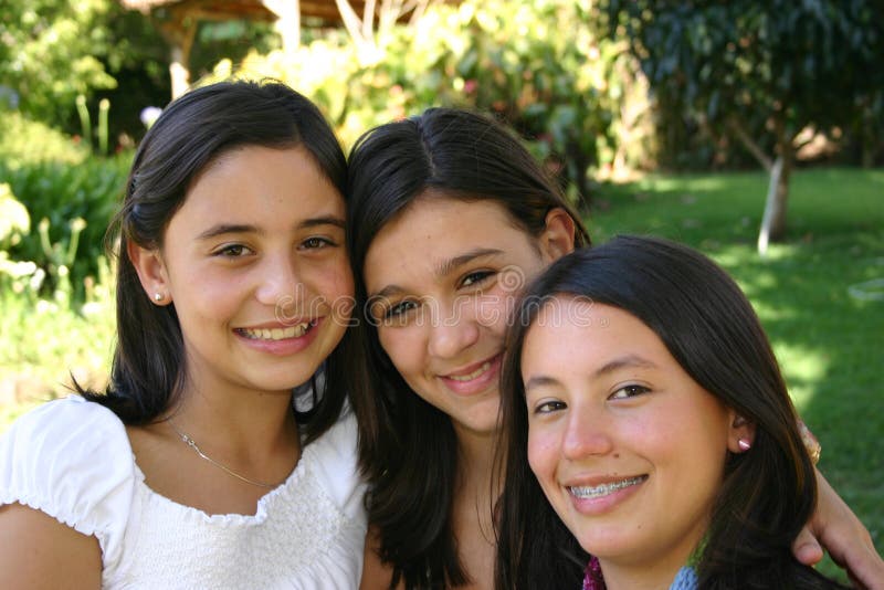 Three happy faces stock image. Image of work, lawn, outside - 660787