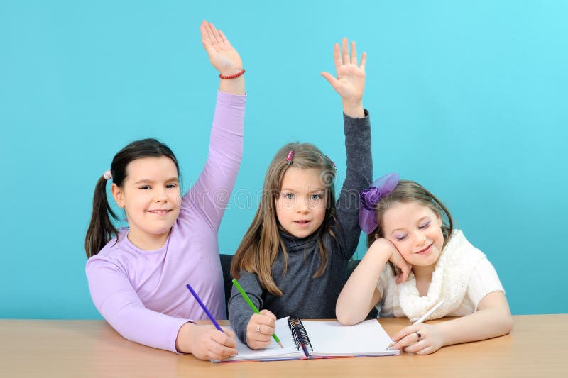 Three Happy Girls Doing Their School Work Stock Photo - Image of group ...