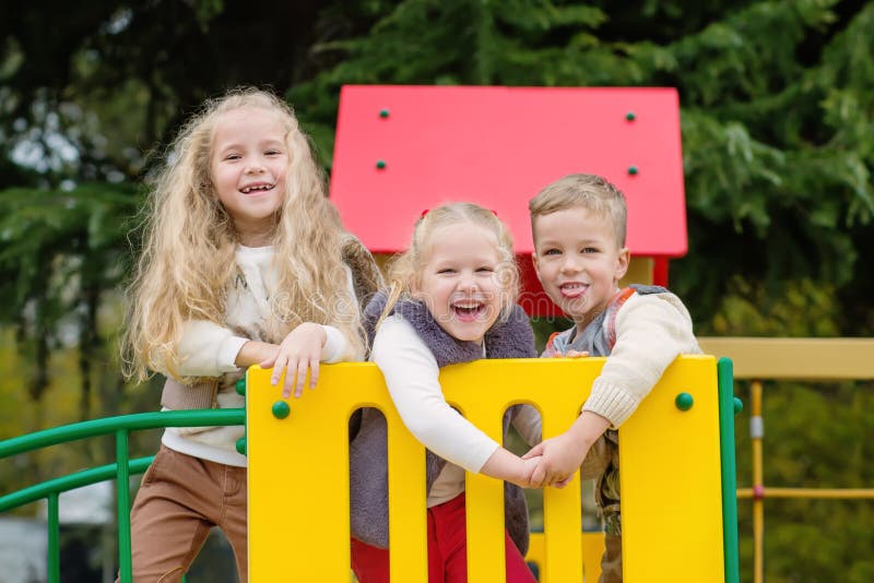 Three Happy Kids Having Fun Together Stock Photo - Image of outdoor ...