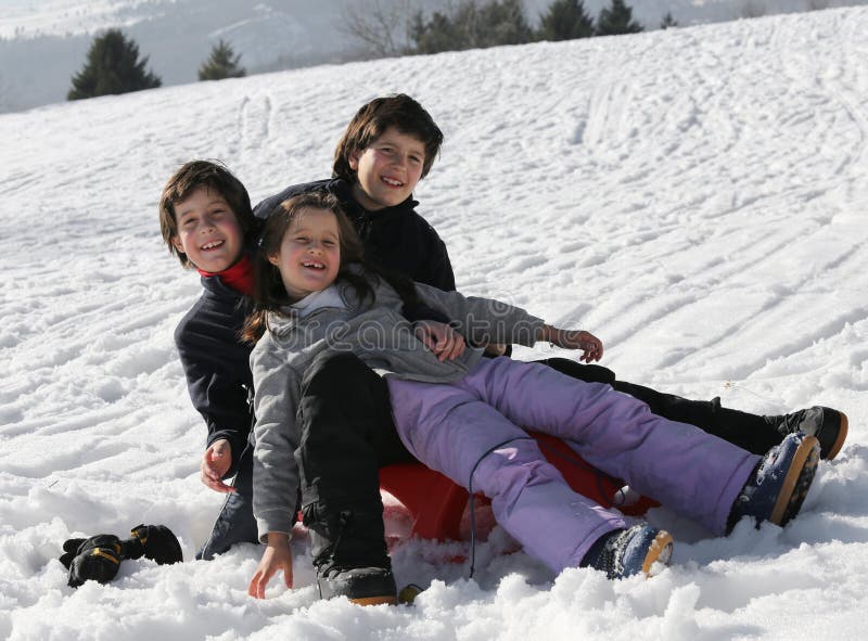 Three Happy Kids on Snow during the Summer Holidays Stock Image - Image ...
