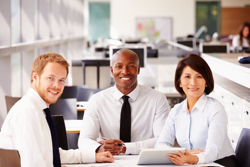 Three Happy Office Colleagues Looking To Camera Stock Image - Image of ...