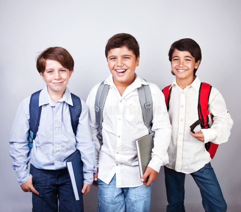 Three happy schoolboys stock photo. Image of little, cute - 26188760