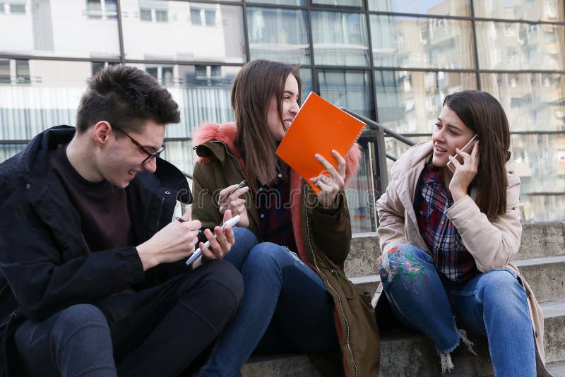Three Happy Smiling High School Students are Learning Stock Photo ...