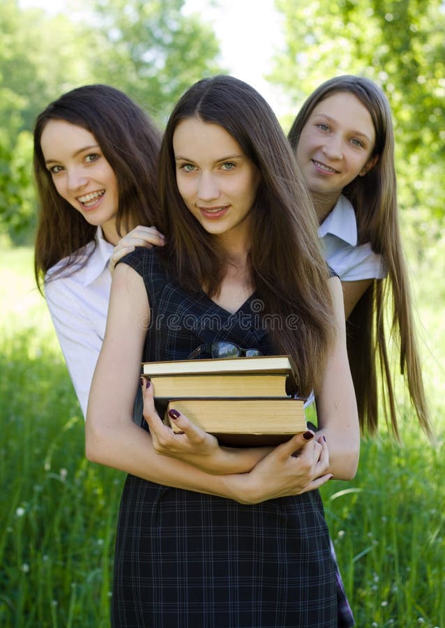 Three Happy Student Girl with Books in the Park Stock Image - Image of ...