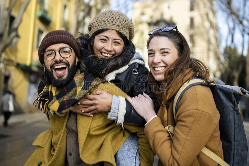 Three Happy Young Friends Having Fun In The City Multiracial Group
