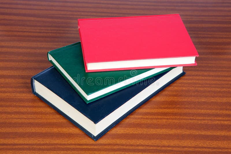 Three hardcover books stock photo. Image of school, document - 21266882