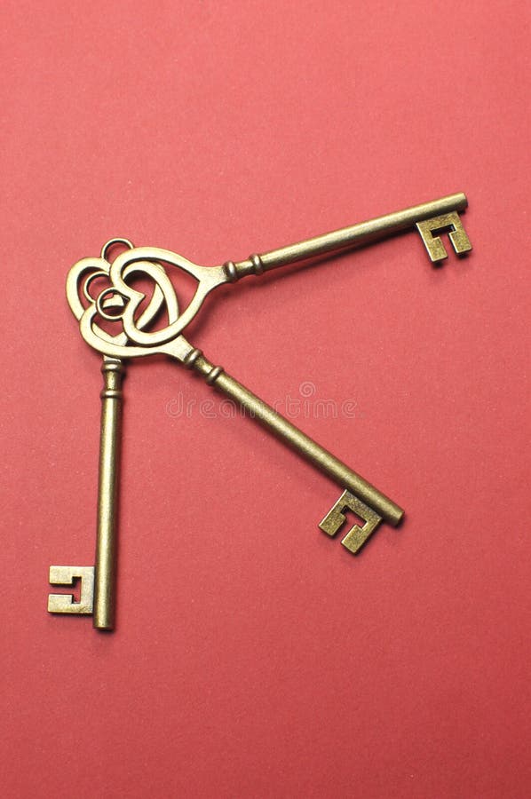 Three Heart Shape Gold Keys - Vertical. Stock Photo - Image of gold ...
