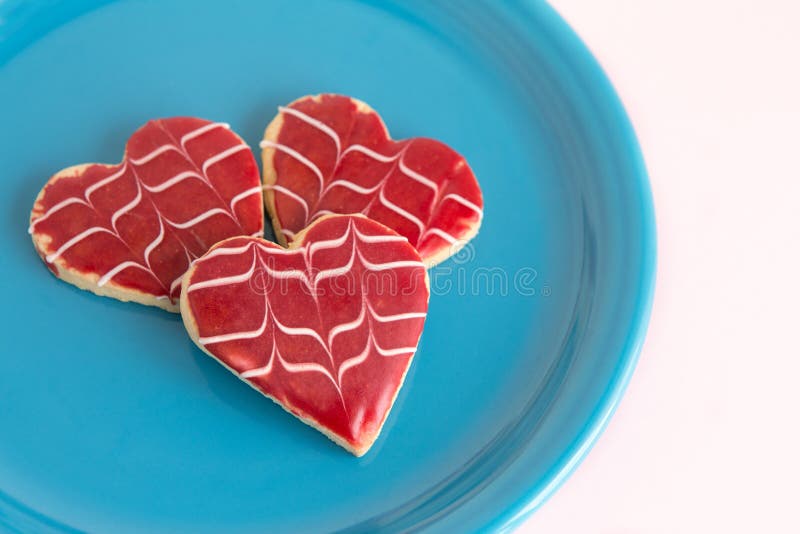 Three Heart Shaped Cookies on a Plate Stock Image - Image of heart ...