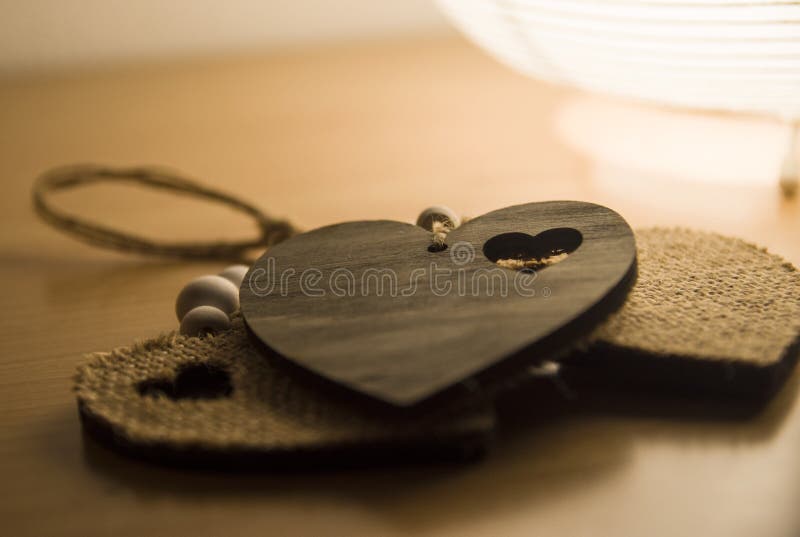 Three Hearts on Wooden Table Stock Photo - Image of valentine, loving ...