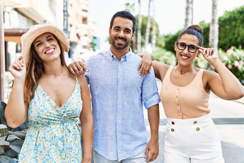Three Hispanic Friends Smiling Happy Standing at the City Stock Image ...