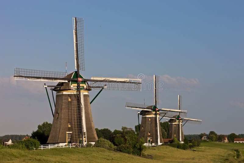 Three Historic Windmills on a Cloudy Day Stock Image - Image of ...