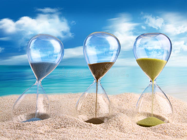 Three Hourglass in the Sand Stock Image - Image of seconds, hourglass ...