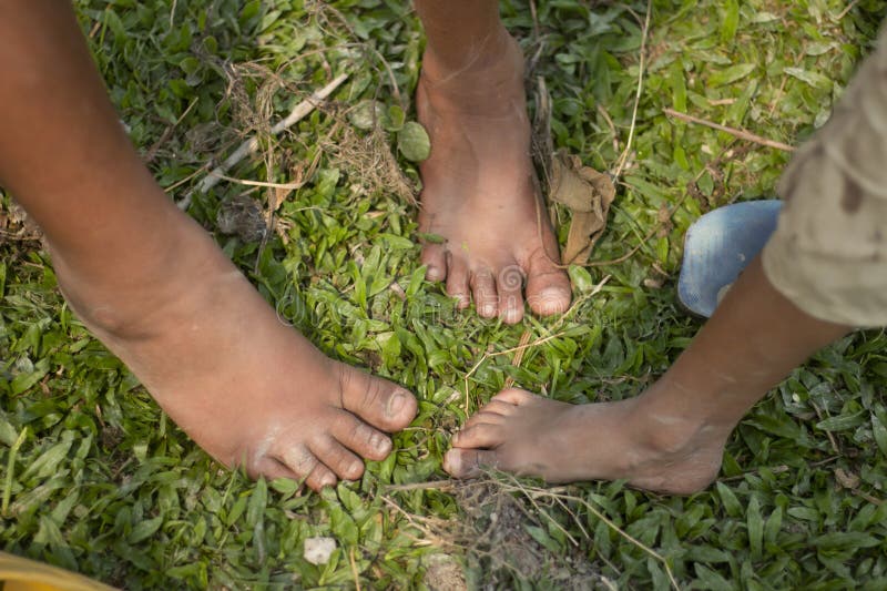 Three Human Feet Together on the Ground Stock Photo - Image of finger ...